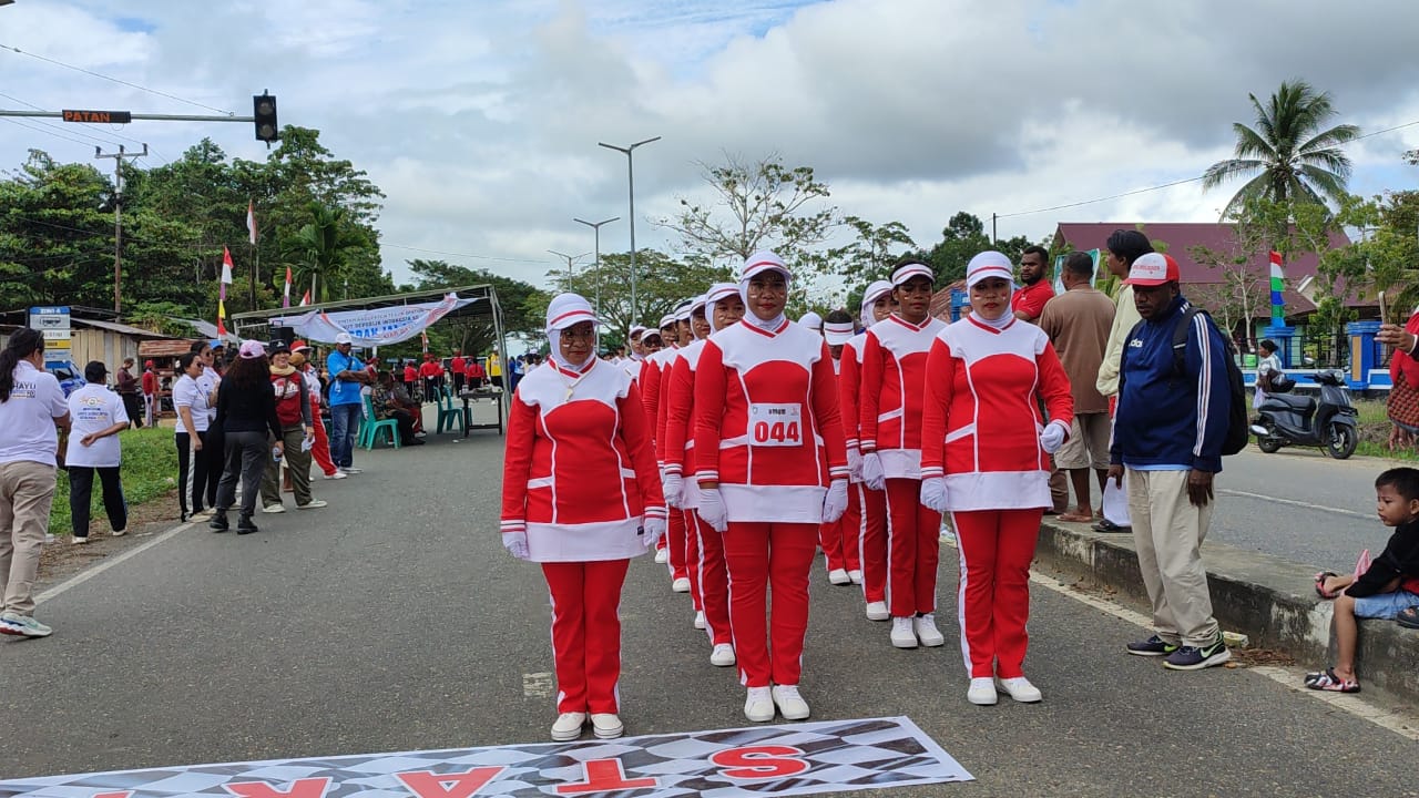 Dalam Rangka HUT RI Ke 79, Dispora Gelar Lomba Gerak Jalan – Suara Teluk